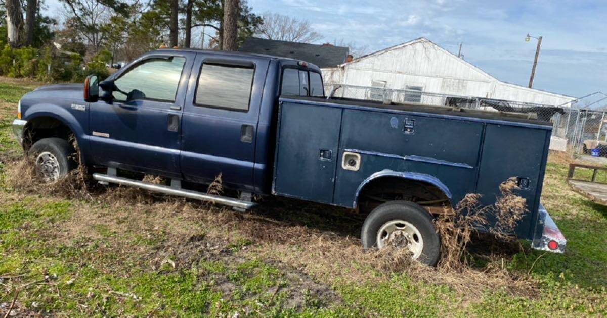 Ford F350 super duty quad cab 4X4 with work body bed for $3500 in ...