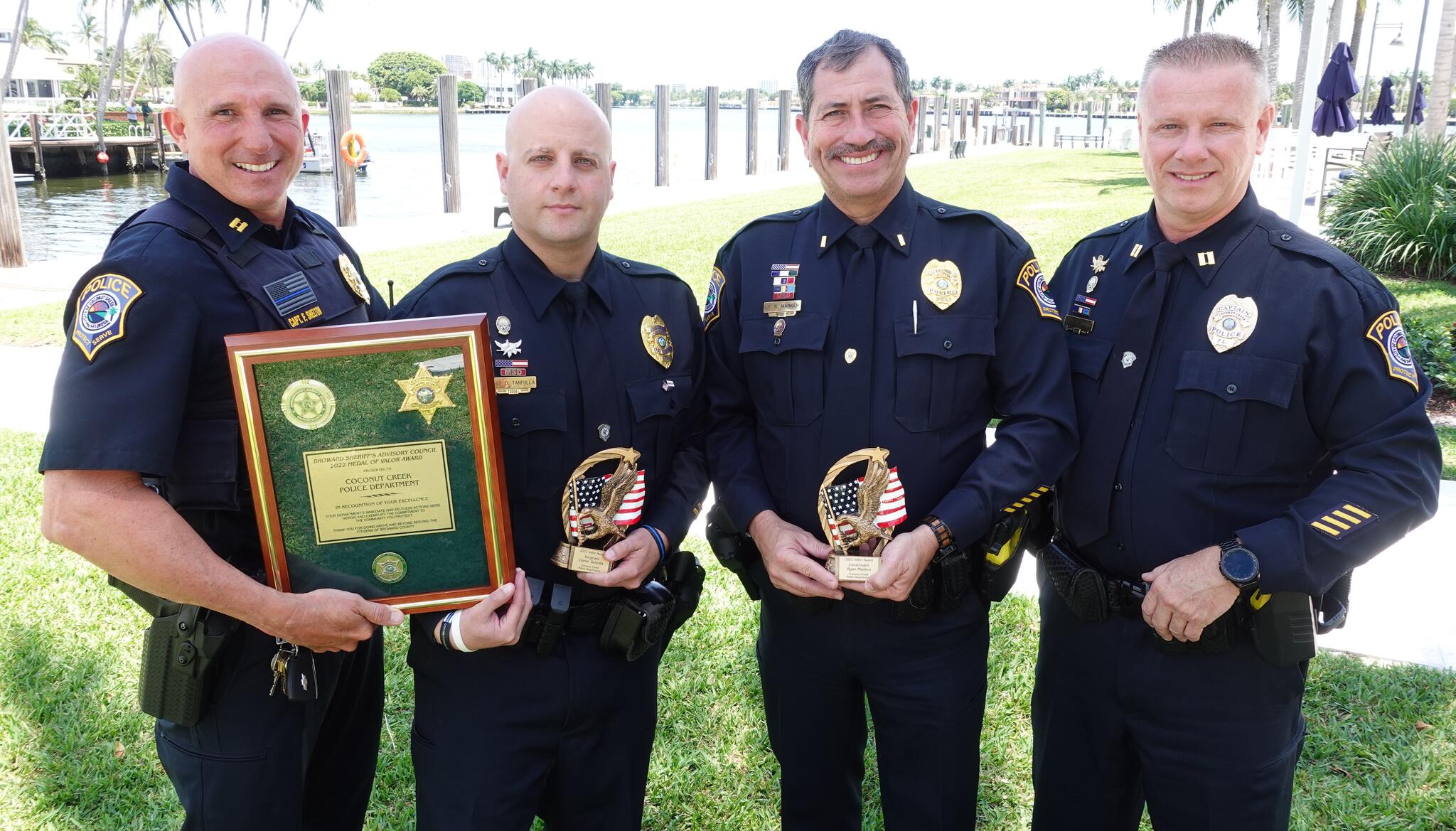 Congratulations to Lieutenant Marken [second from right] and Sergeant ...
