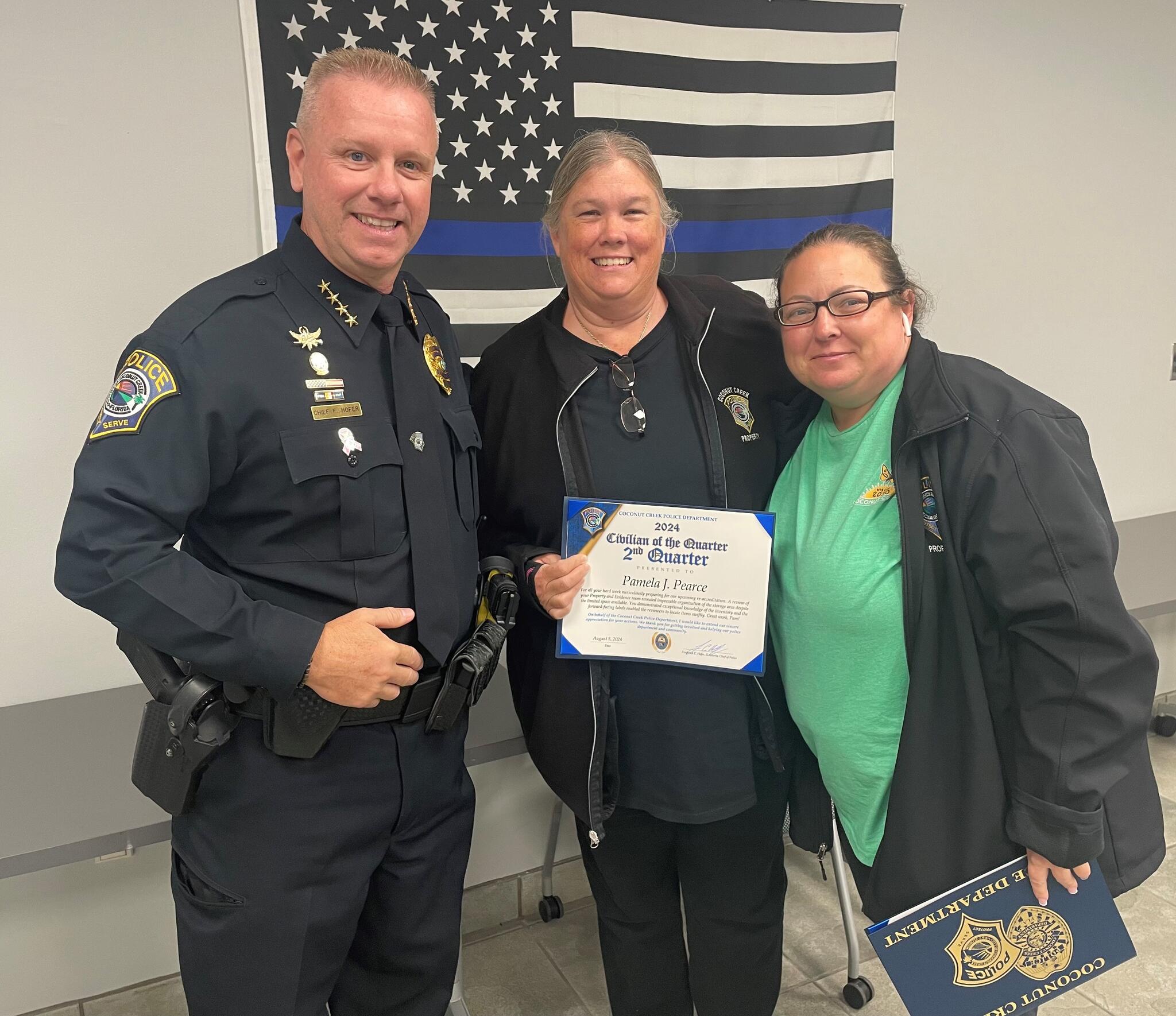 Congratulations to Property & Evidence Custodian Pearce (middle) and ...