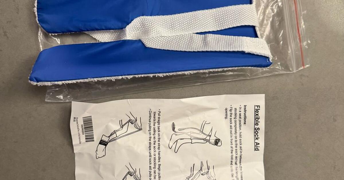 Flexible sock aid. helps you put your socks on if you’re limited on ...