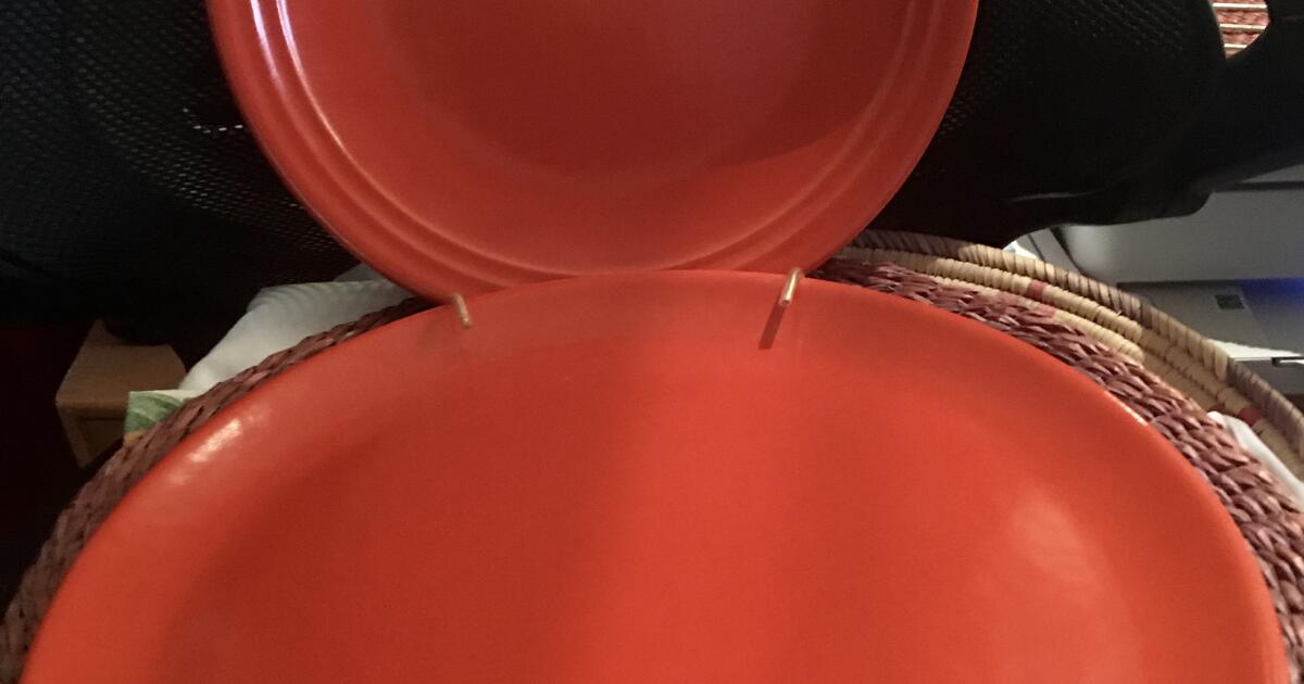 Two large orange platters, one with a Poppytrail mark for $50 in Palm ...