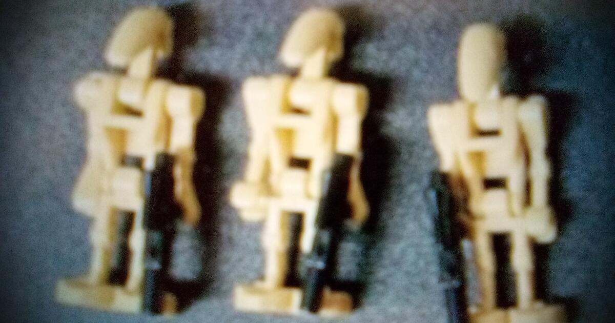 My son is selling his 3 lego Star wars droids with weapons for $12 in ...