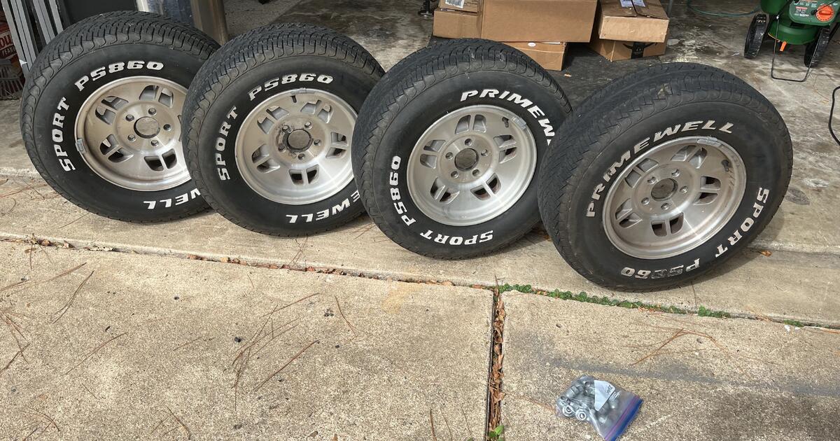 OEM Cast Aluminum 10 Holes 14 x 6 in Wheels and Tires from a 1997 Ford ...