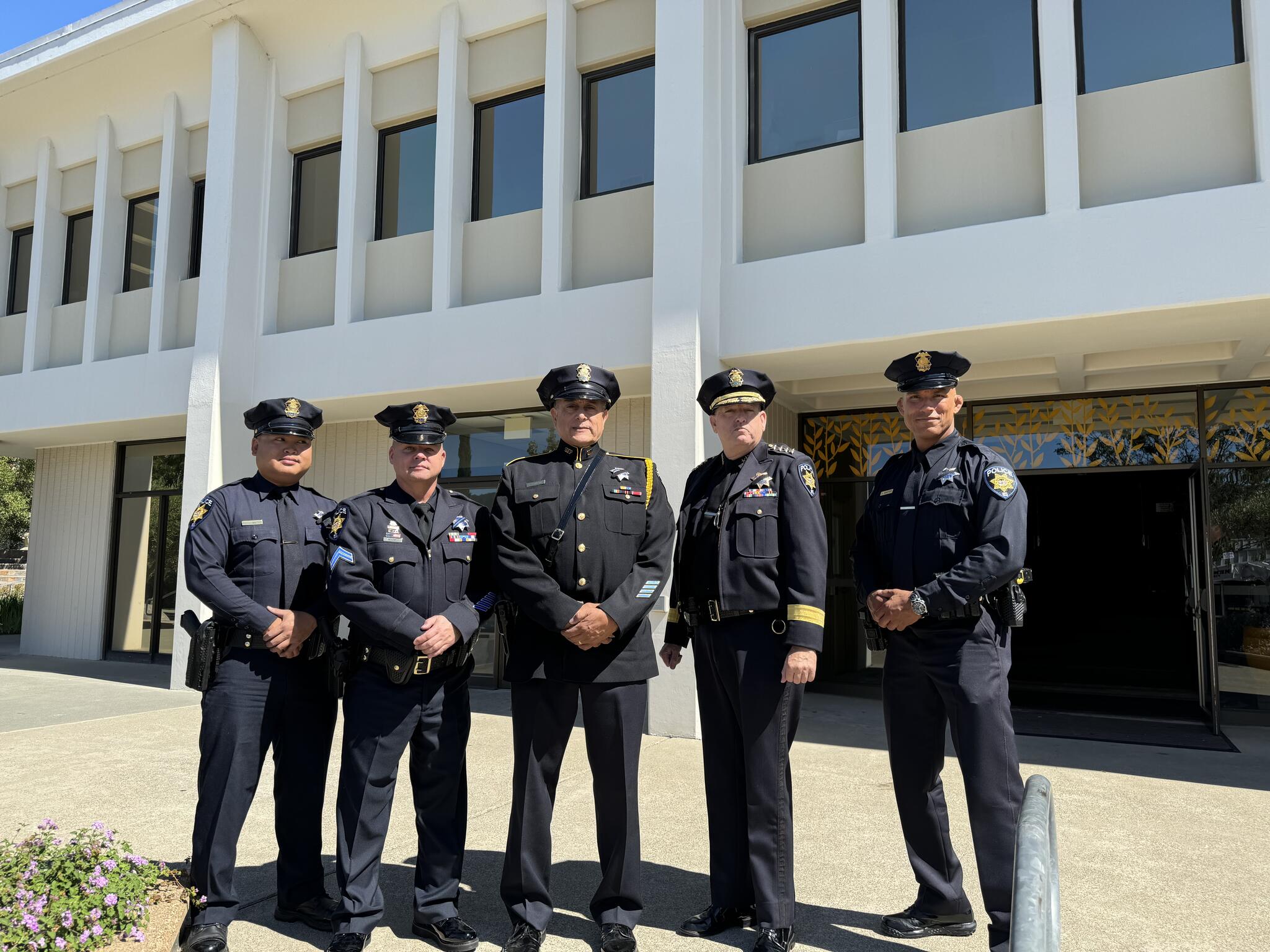 Members of the Broadmoor Police Department, including Chief Connolly ...