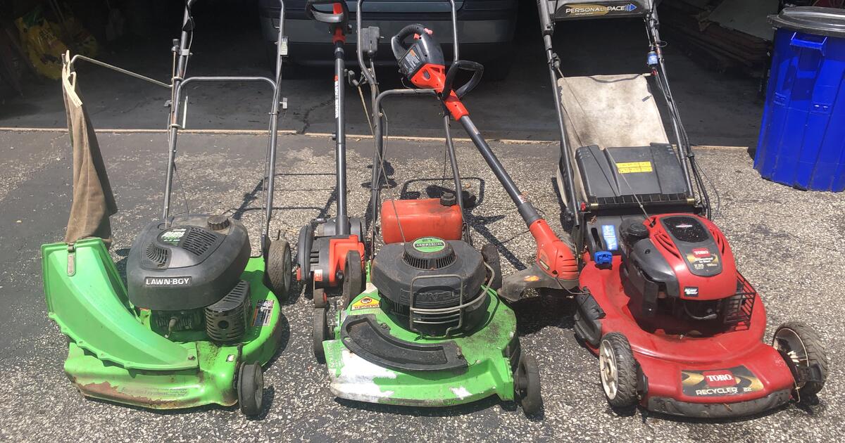 Two lawn boy and one toro mowers and two black & decker trimmer and ...