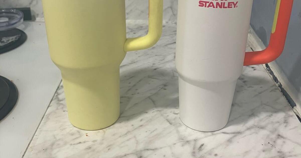 Stanley Cup (Pale Yellow) 30 oz and the slightly skinnier white cup has ...