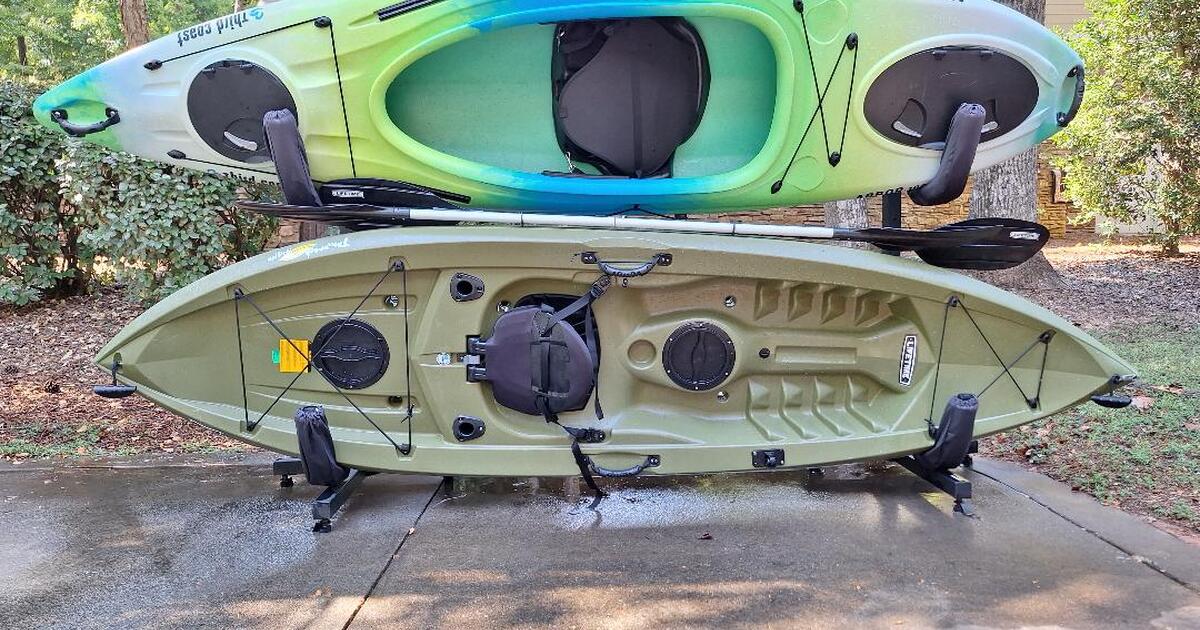 Two Kayaks (with paddles) + Standing Storage Rack for $600 in ...