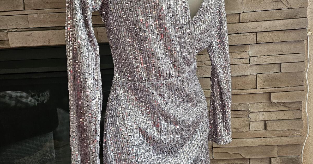 Formal Silver sequence long sleeve mini Sz. Lg. for $8 in Rio Rancho ...