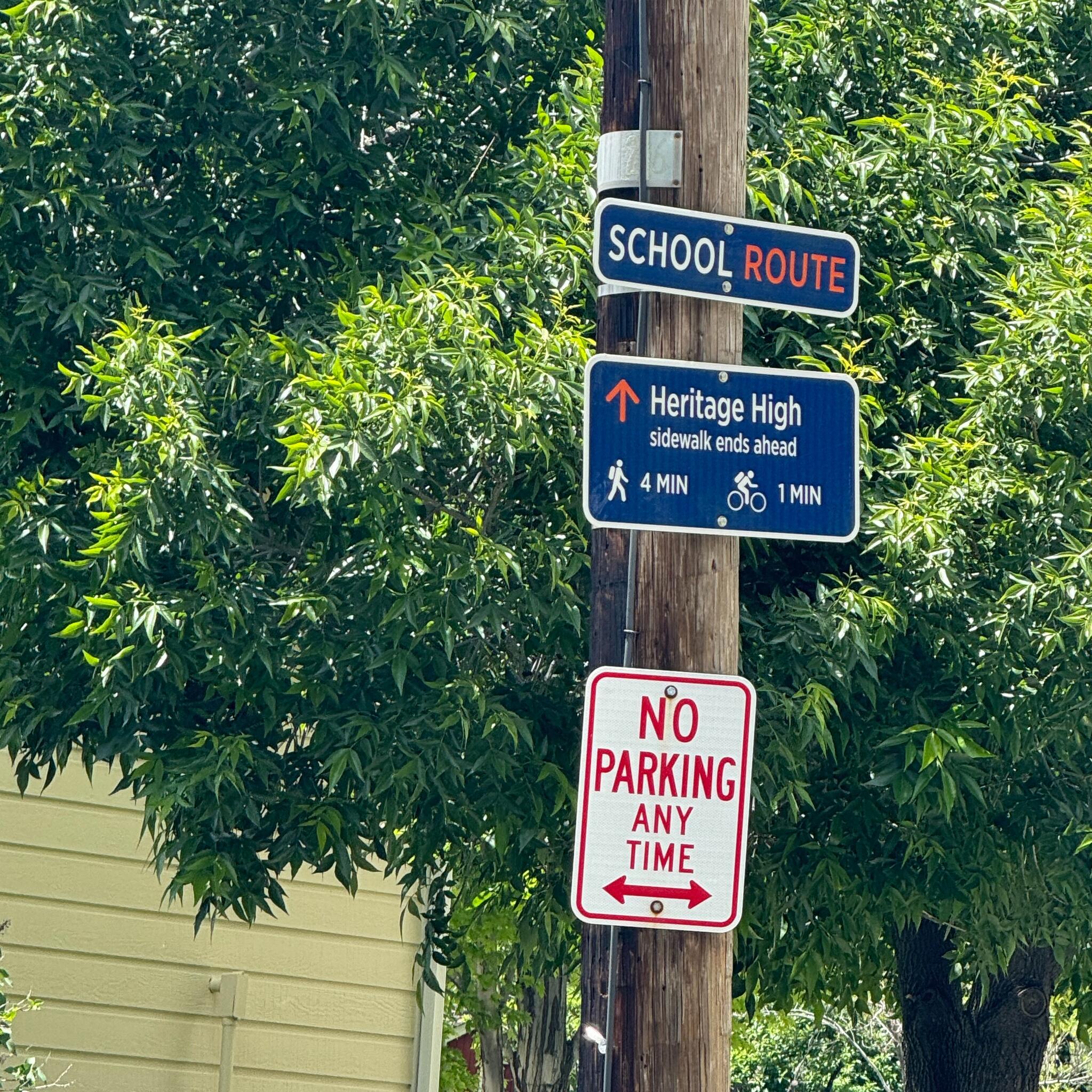 City crews are installing hundreds of signs designating School Route ...