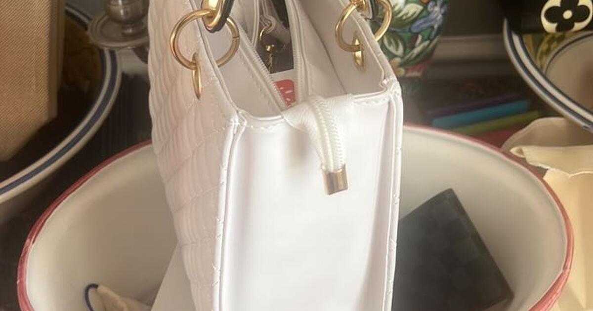 Brand new white bag with attached shoulder strap for $25 in Colts Neck ...