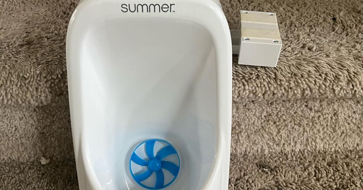 Realistic Urinal for Toddlers That Features Flushing Sounds and a ...