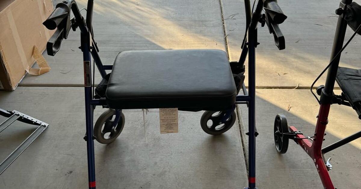 Walkers one tall stand up. One with wheels and seat one regular ...