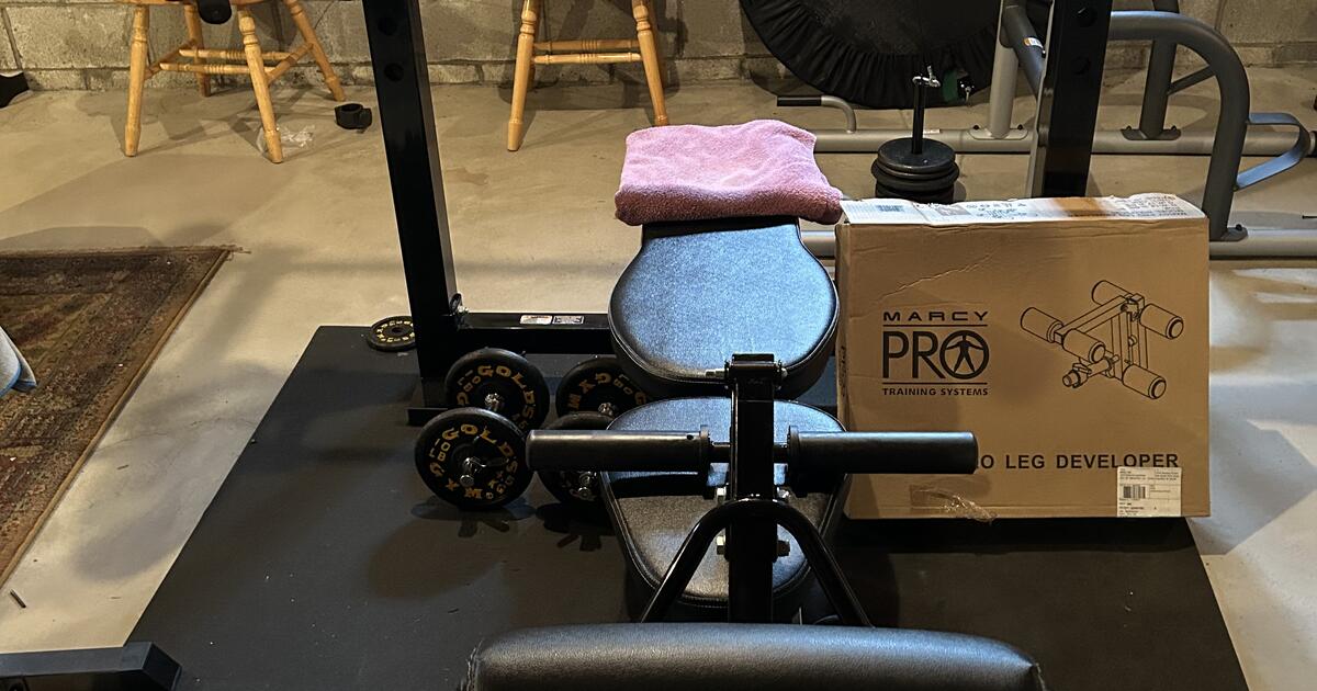 Marcy Pro Weight Bench With Leg Developer, Barbell and Two 50lb Plates ...
