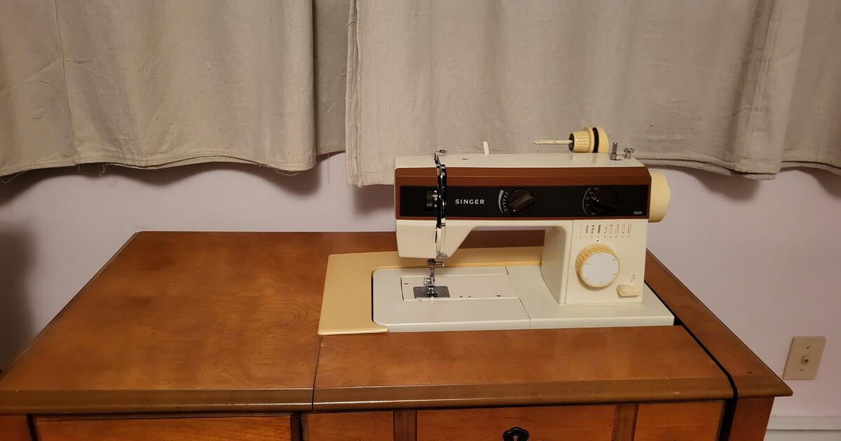 1982 Singer metal sewing machine with cabinet for $50 in Casco, MI ...