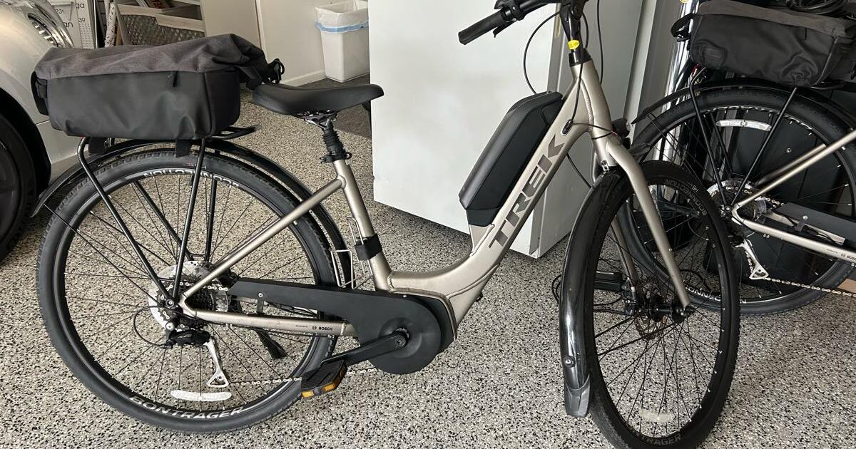Two TREK Ebikes, Verve+2 model, w/2 chargers, bike bags, tire pump ...