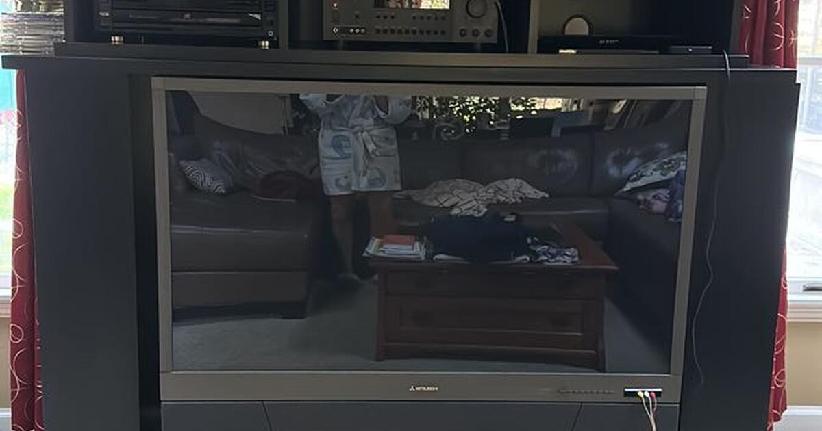 Entertainment center-custom made with older 55” working Mitsubishi ...