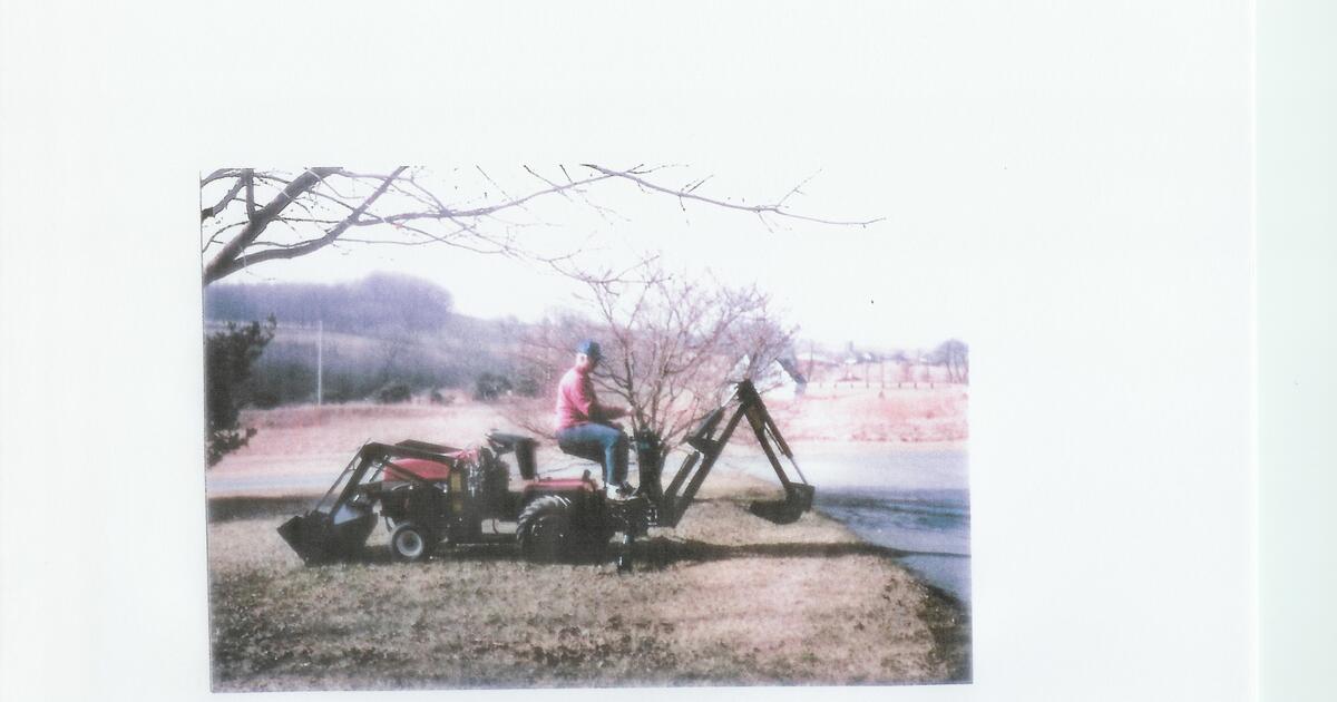 Simplicity Mower with backhoe and front-end loader bucket attached. for ...