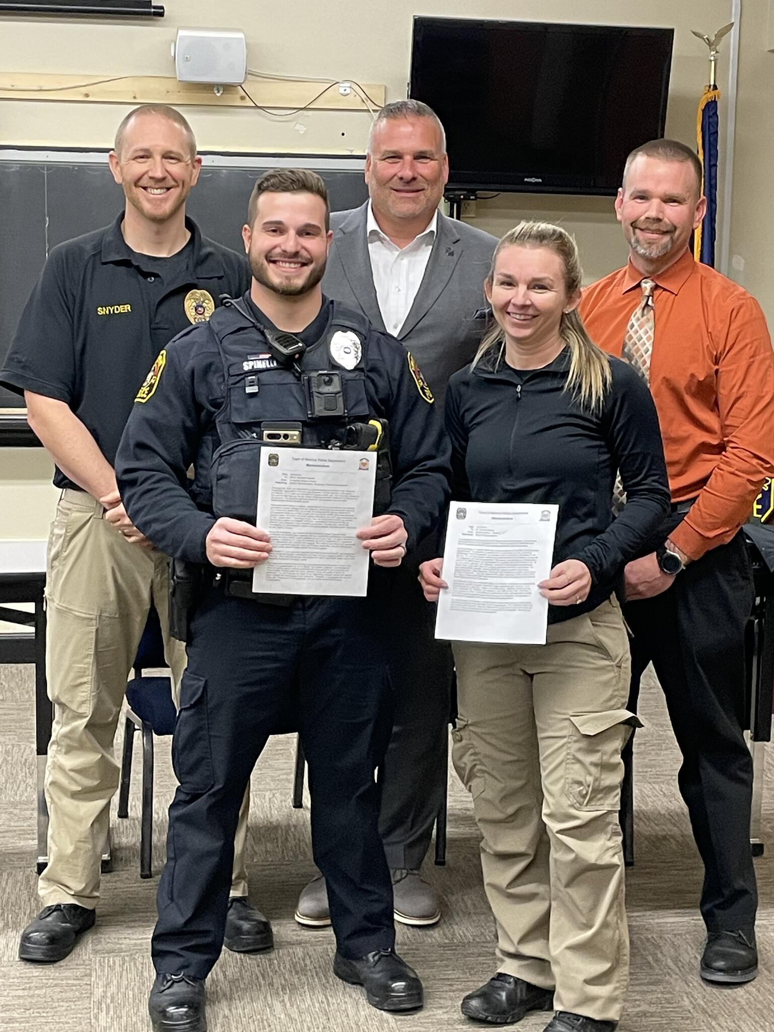 Please join me in congratulating Investigator Sparks and Officer ...