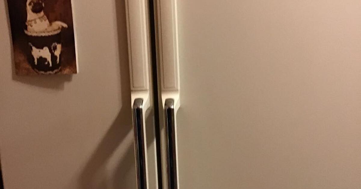 Side by side 32 1/4” wide almond color refrigerator. Available for ...