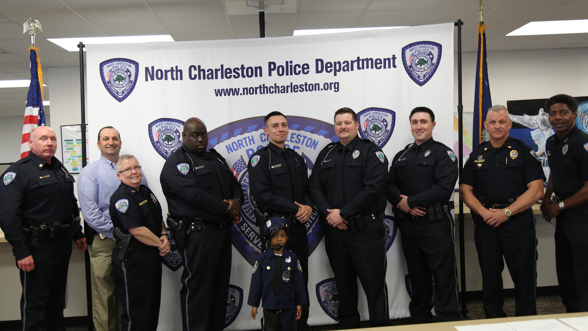 NCPD swears in four new officer and four-year old honorary officer ...