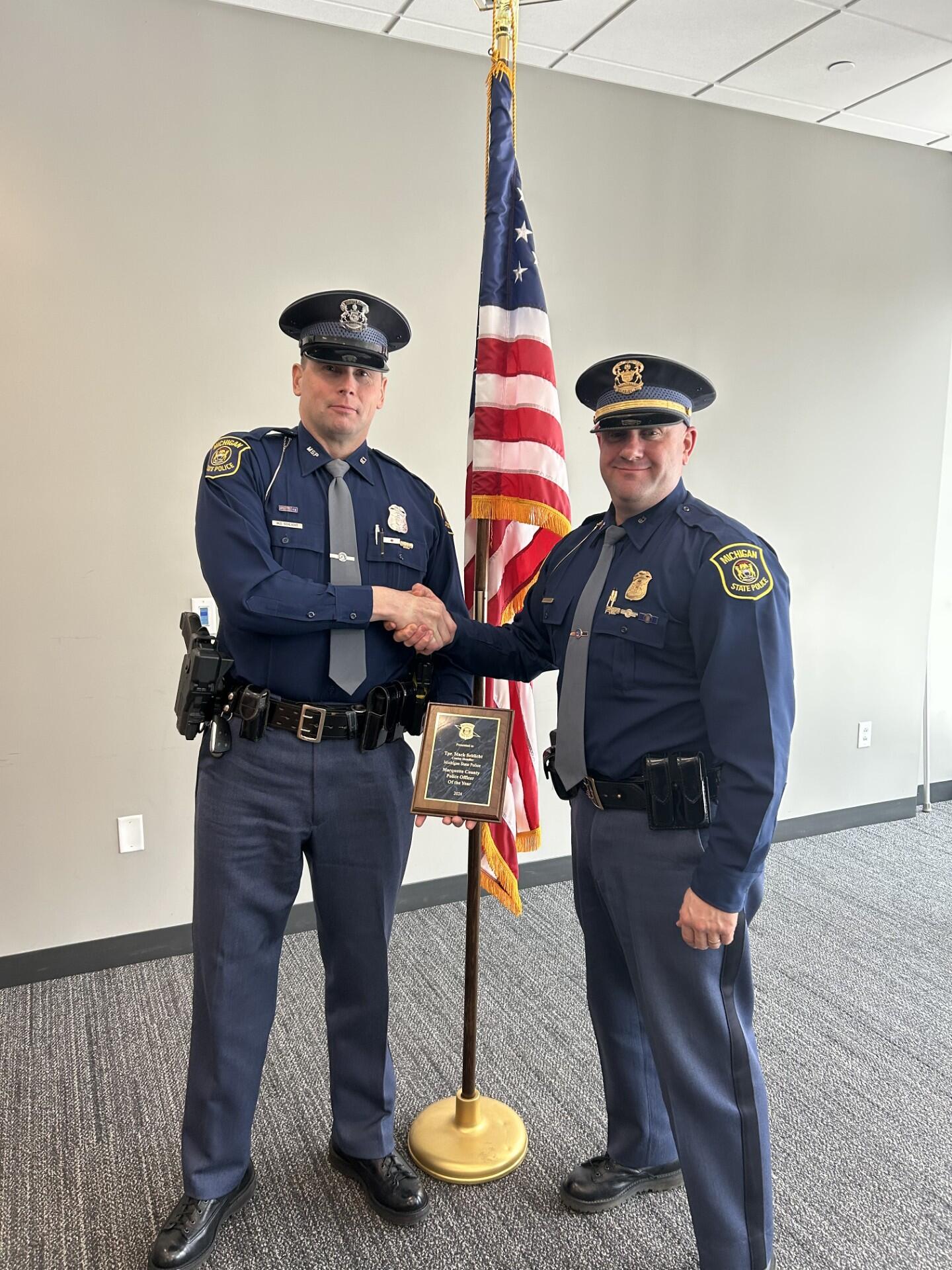 Trooper Mack Schlicht of the Negaunee Post is being recognized as the ...