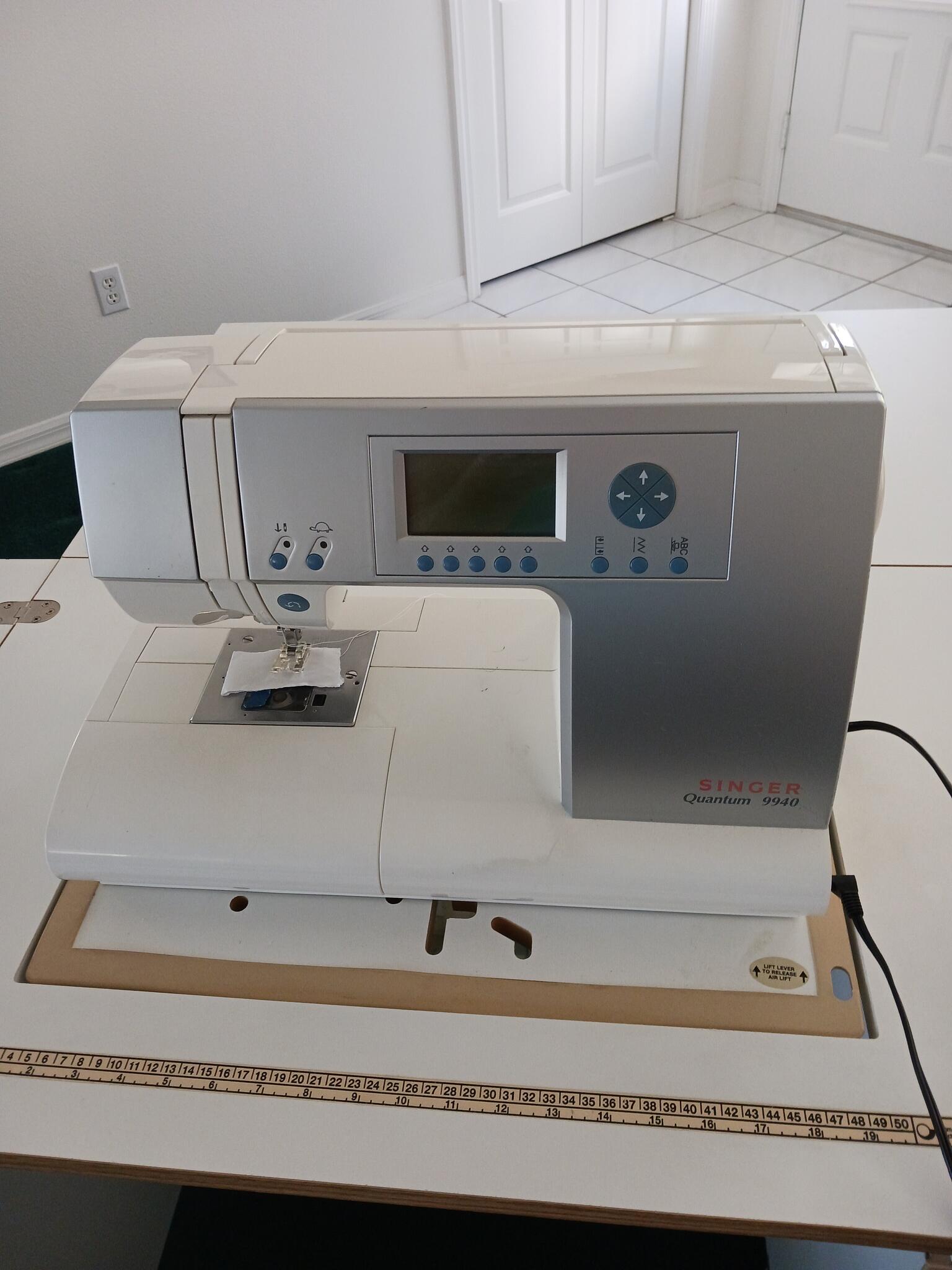 Singer Quantum 9940 Sewing Machine and Sewing/Craft Csbinet for $500 in ...