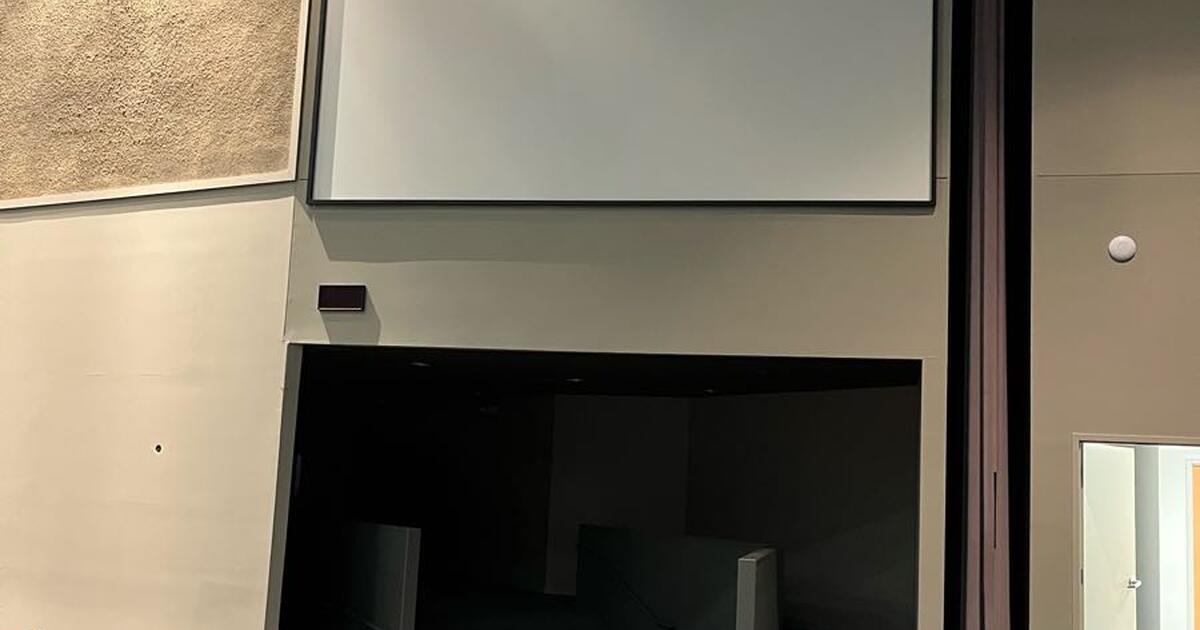 Three of these framed projection screens. They are 18 feet wide and 16 ...