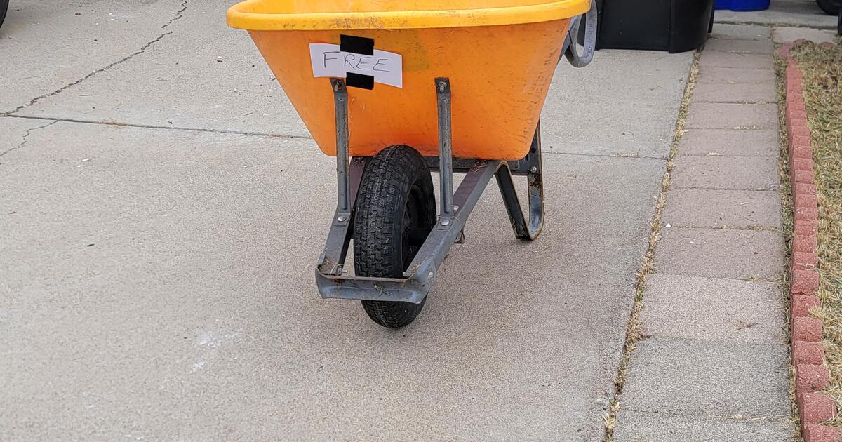 Grab and Go. 2x metal shelving, wheelbarrow, 1 door slab, 1 door with hardware for Free in ...