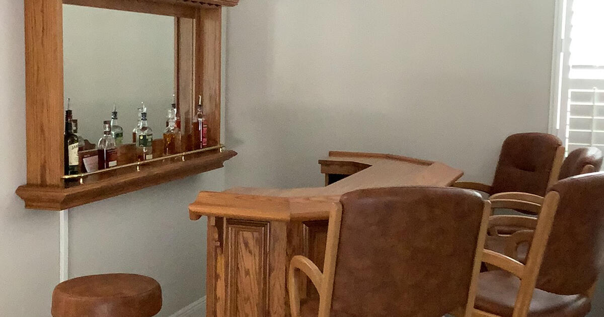 Oak bar, mirror, four leather bar chairs, one bartender stool for $2500 ...